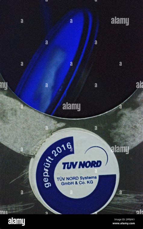 Vertical Closeup Of A Broken Escalator Column With Tuev Nord Test Seal