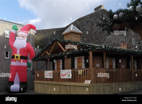 Santa Grotto With Large Inflatable Father Christmas Santa Claus Stock
