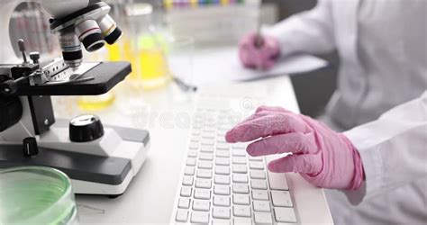 Advanced Laboratory Research Involving Microscope And Computer System Configuration Stock