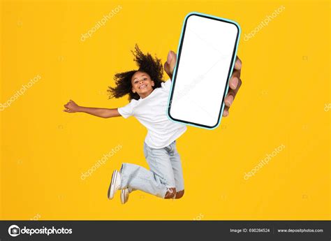 African American Teenage Girl Showing Huge Smartphone Blank Screen