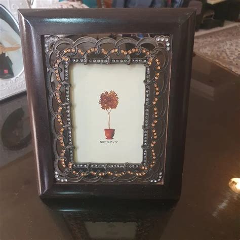 کمدا قیمت و خرید قاب عکس تزینی چوبی رنگ قهوه ای سایز 19 در 22 سانت و
