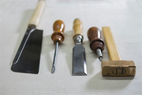 Premium Photo Saw Screwdriver Chisel And Hammer