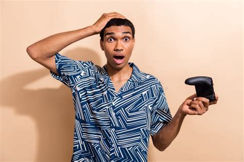 Photo Of Impressed Shocked Guy Dressed Print Shirt Loosing Playstation