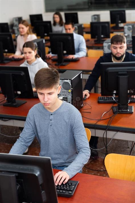 Group Of People Of Different Ages Learning To Use Computers In Classroom Stock Image Image Of