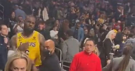 Lebron James Held Back By Security After Reacting To Abusive Heckles