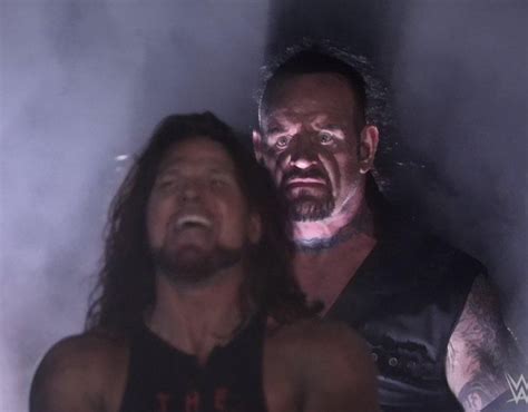 Undertaker Standing Behind Aj Styles Meming Wiki
