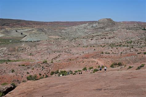 Hikers On Delicate Arch Trail In Arches National Park Near Moab Utah Stock Image Image Of