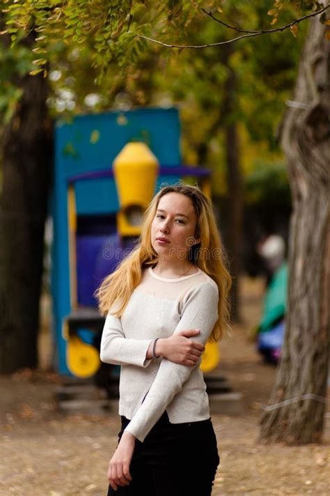 Beautiful Girl Stands In The Autumn In The Park Stock Image Image Of