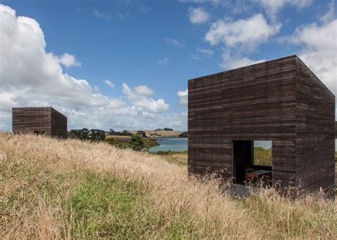 Cheshire Architects Blackened Timber Cabins Overlook The Sea