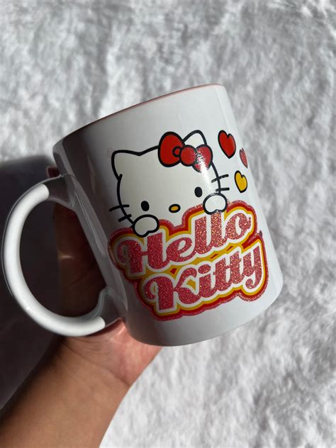 Taza Hello Kitty Corazones Candayelstore