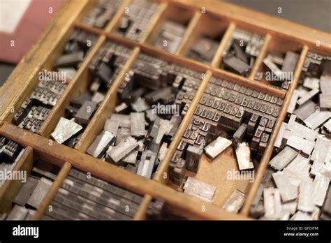 Close Up Of Metal Letterpress Letters In Printing Machinecolor Image