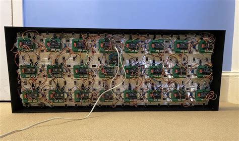 This Digital Clock Uses 24 Arduino Controlled Analog Faces — Pmd Way