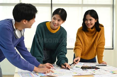 Image Of Mobile Application Designers Team Discussing Brainstorming