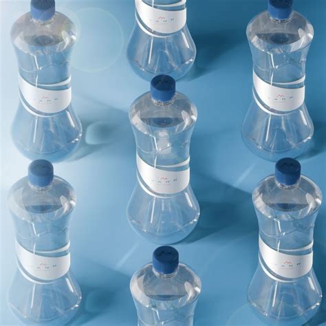Vann Clear Water Bottles On Blue Background Дизайн бутылок Вода