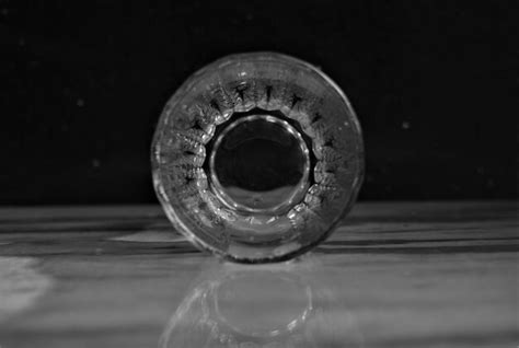 Premium Photo Monochrome Drinking Glass On A Table