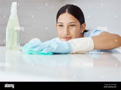 Cleaning Disinfect And Housework With Woman Washing Kitchen Table With