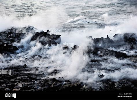 Steam Rising Off Lava Flowing Into Ocean Kilauea Volcano Big Island