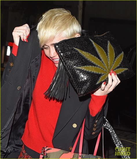 Miley Cyrus Enters A Club Fully Clothed Leaves In Her Bra Photo Miley Cyrus Photos