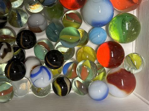 Hello There Looking For Any Info On Any Of These Marbles There Are Some Shooters As Well As