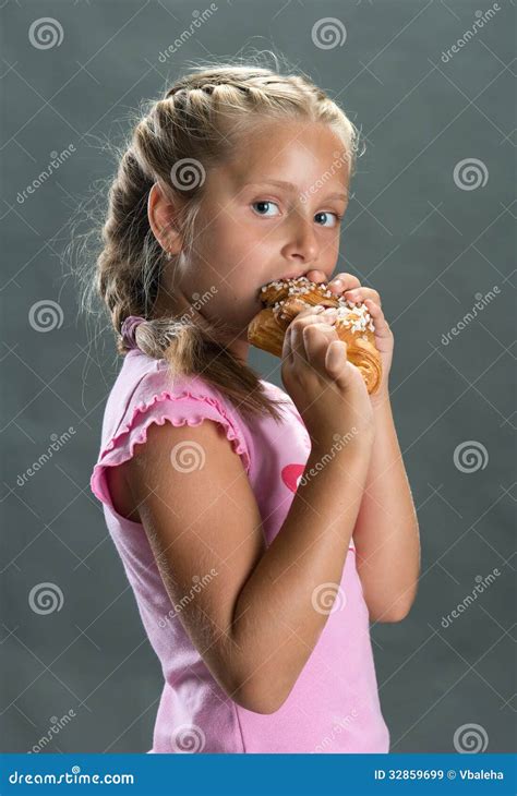 Pretty Girl Eating Cookie Royalty Free Stock Images Image 32859699