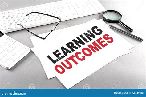 Learning Outcomes Text On A Paper On A Gray Background Near A Calculator And A White Keyboard