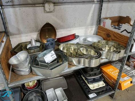 Shelf Of Assorted Cake Pans Roller Auctions