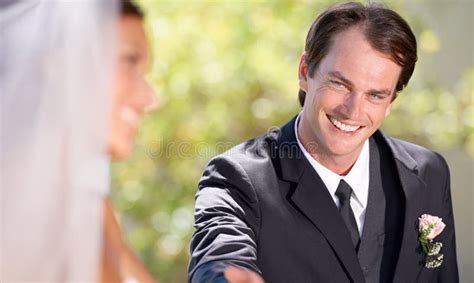 Taking Their First Step Together As Husband And Wife A Bride And Groom
