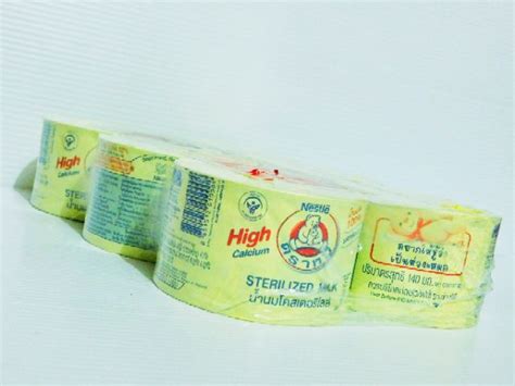 Nestle ตราหมี นมโค100มีสองรสชาติ 6กระป๋องแพ็ค Aminah Daud Thaipick