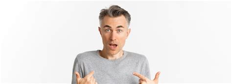 Premium Photo Closeup Of Confused Middleaged Man Pointing At Himself And Gasping Standing Over