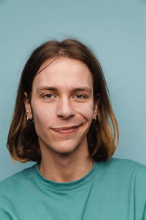 Young White Man Wearing T Shirt Smiling And Looking At Camera Stock