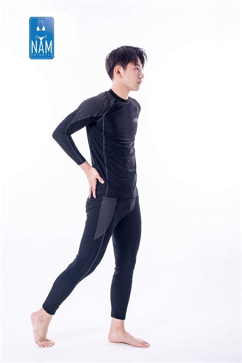 ชุดว่ายน้ำผู้ชาย Tbl 91008 แบบ 2 ชิ้น แขนยาว ขายาว สีพื้นดำ ผ้าดีใส่แร้วไม่ร้อน Nam Swimwear