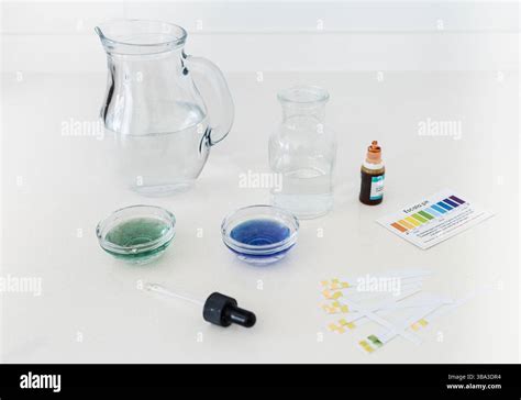 Photographs Of A Water Ph Testing Kit Including Color Indicator Drops