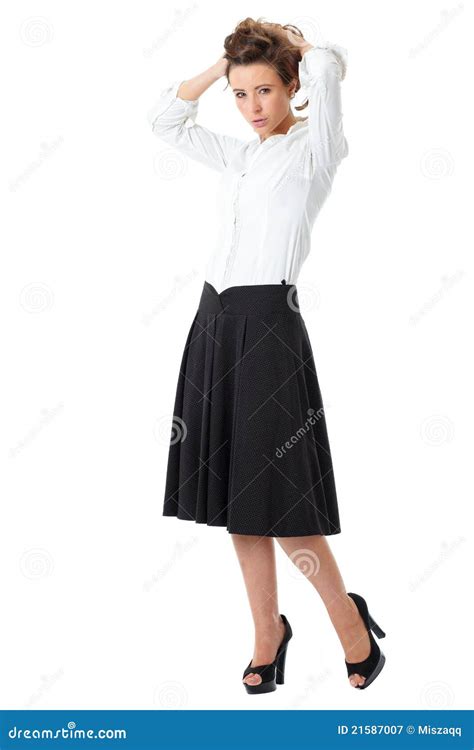 Femelle Attirante Dans La Chemise Blanche Et La Jupe Noire Image Stock