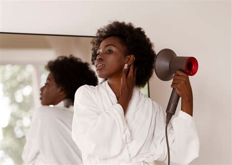 Free Photo Woman Styling Afro Hair Medium Shot