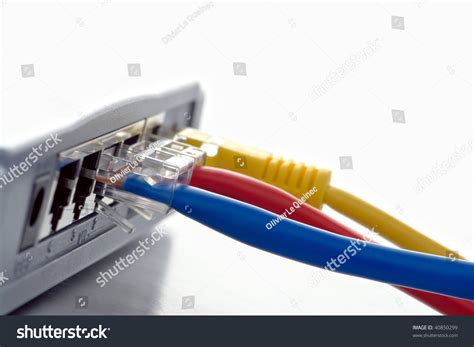 Rj 45 Ethernet Computer Network Cable Jacks Plugged Into A Router Lan Port Stock Photo 40850299