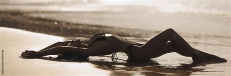 Sexy Bikini Beach Vacation Woman Laying On The Beach In Freedom Stock Photo Adobe Stock