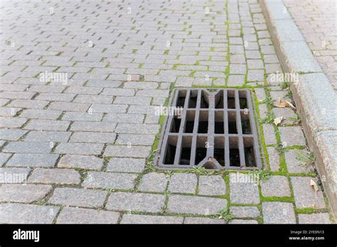 Drain Storm Drainage Flood Street Water Road Manhole Sewer Sewerage Sewage Rain Grate Stock