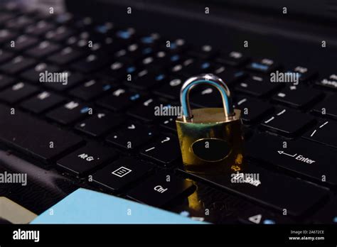 Gold Padlock Digital Data Protection Isolated On Laptop Keyboard Background Security Concept