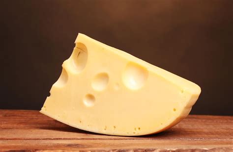 Premium Photo Sheese On Wooden Board In The Room