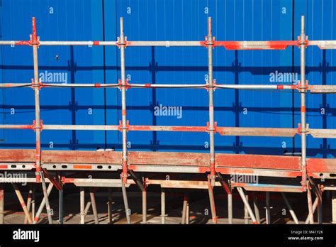 Colorful Scaffold On A Construction Site With Blue Background Stock