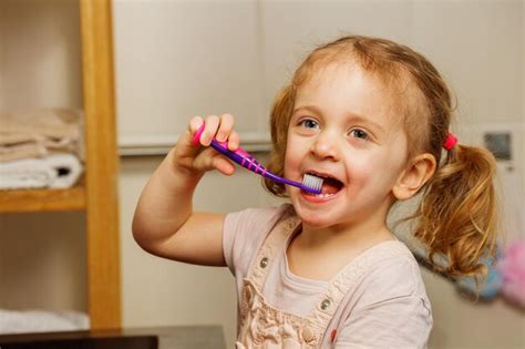 Premium Photo Close Up Of Young Woman Holding Thermometer