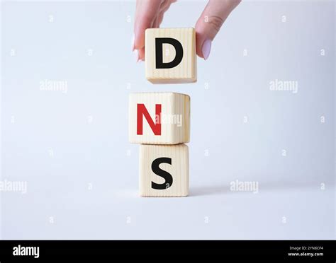 Dns Domain Name Server Consumer Price Index Symbol Concept Word Dns On Wooden Cubes