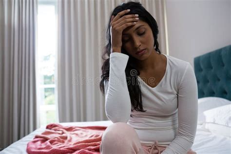 Tired Woman Sitting On Bed Stock Image Image Of Millennial 97402893