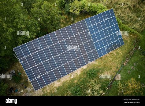 Aerial View Of Solar Panels In Green Field At Daytime Different Types Of Ground Mounted