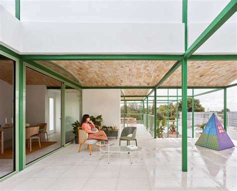 Space Populars Brick Vault House Slots Into Slender Green Grid