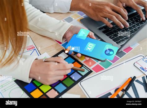 ui designer and ux developer brainstorm idea to design the application interface creative