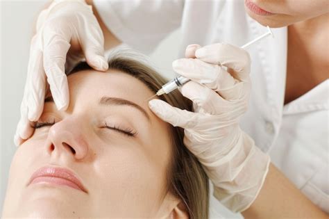 Doctor Injecting Botox Into Woman39s Face Premium Ai Generated Image