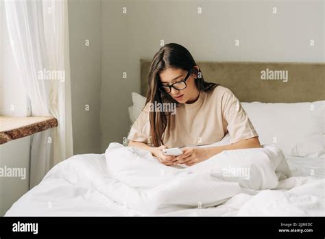 Modern Addiction To Gadgets The Girl Immediately Uses The Phone After