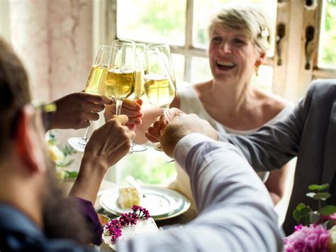 Premium Photo Group Of Diverse People Clinking Wine Glasses Together