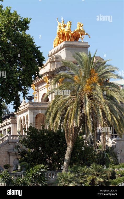 The Barcelona Quadriga De Le Aurora With A Golden Chariot On Top Of A